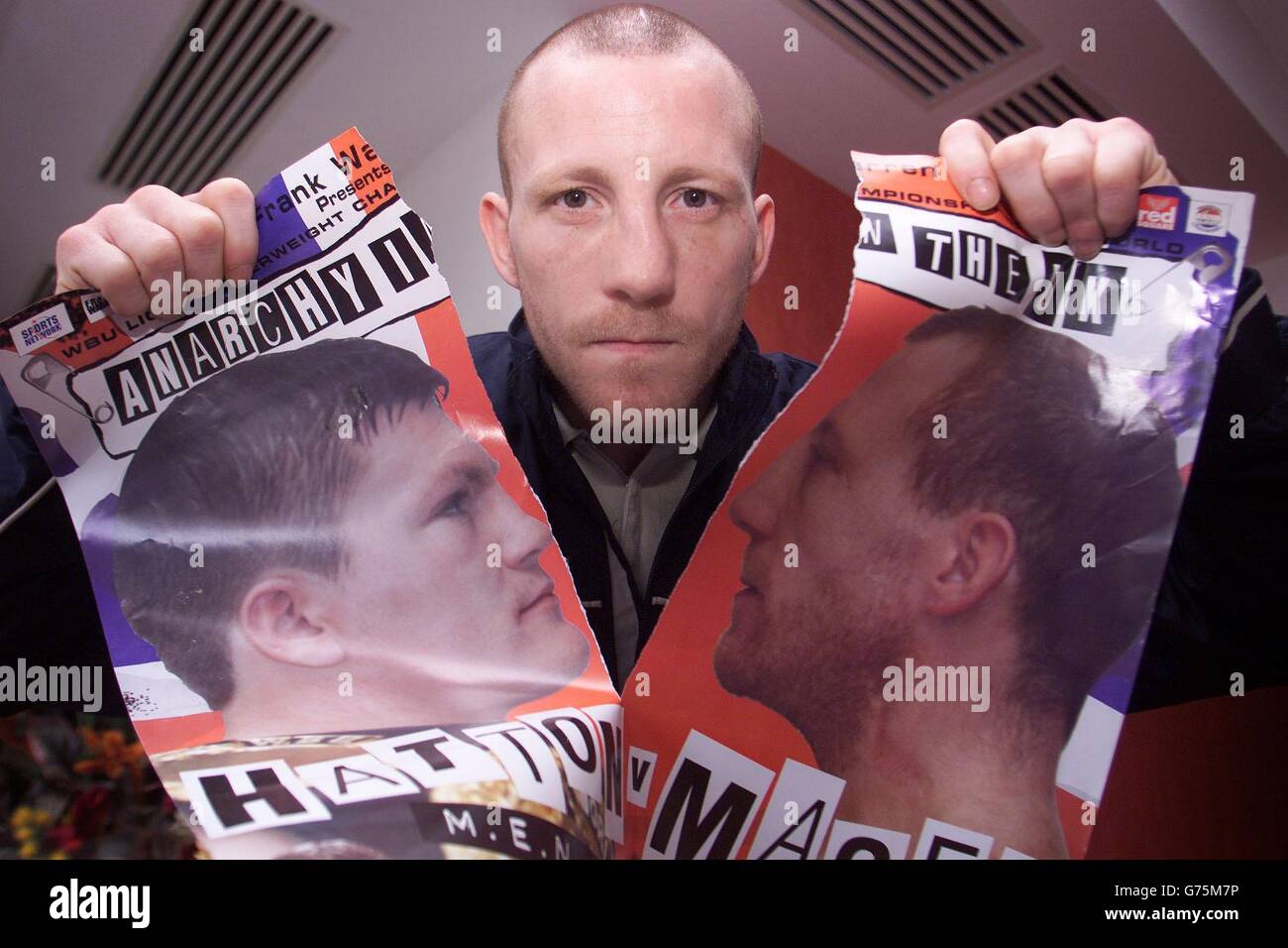 Belfast boxer eamon magee tears poster carrying photograph opponent hi ...