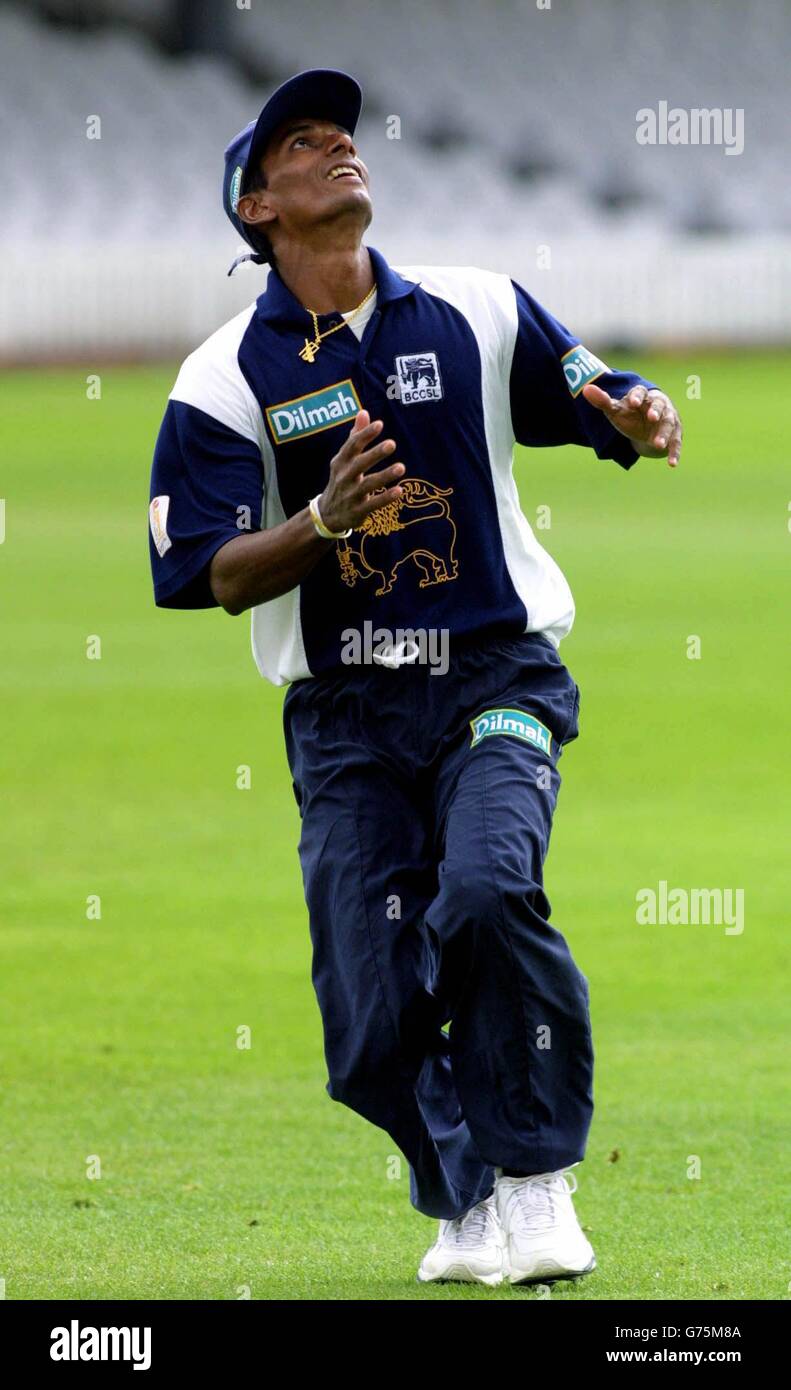 Sri Lanka's Upul Chandana getting in line for a catch during a training ...