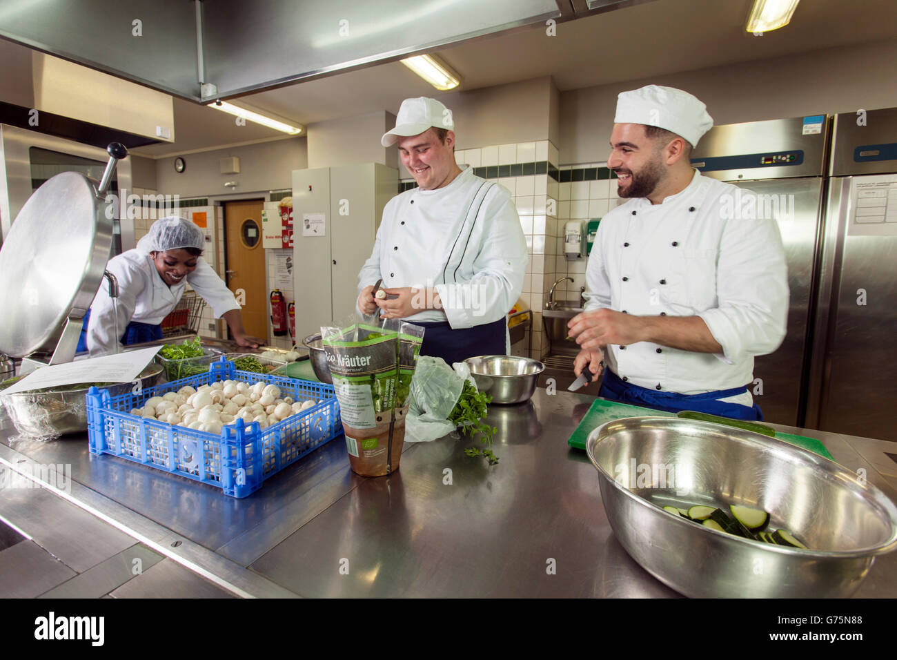 Preparations for lunch in a commercial kitchen Stock Photo - Alamy