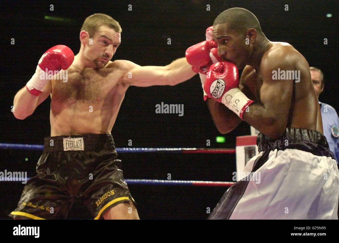 Scotland's Scott Harrison lands a punch on Puerto Rico's Victor ...