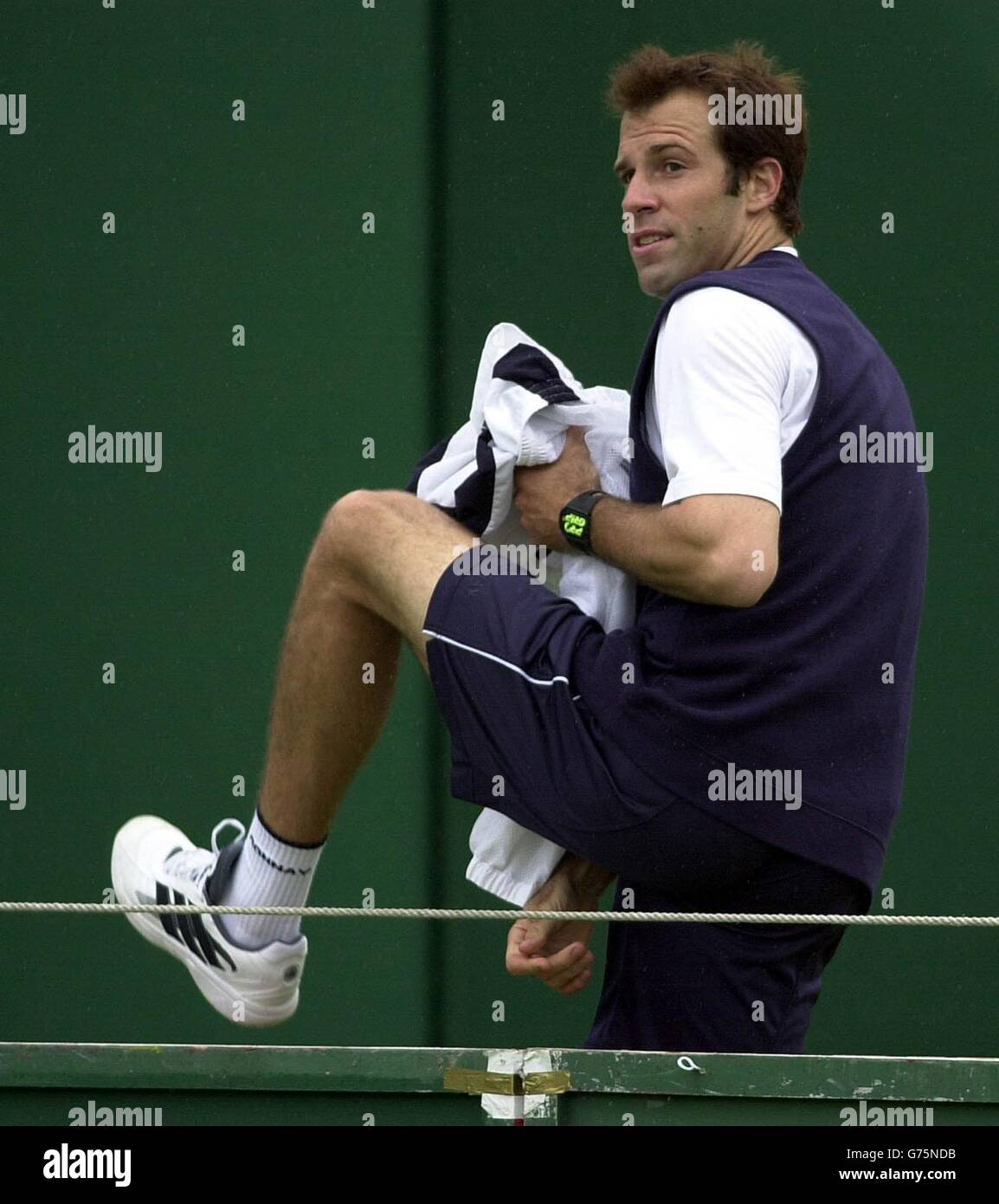 Greg Rusedski warms up for the Stella Artois Championships, Queens Club ...