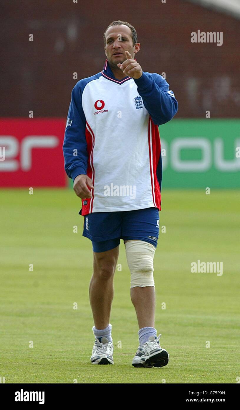 England's Mark Butcher, with his left knee strapped during a practice ...