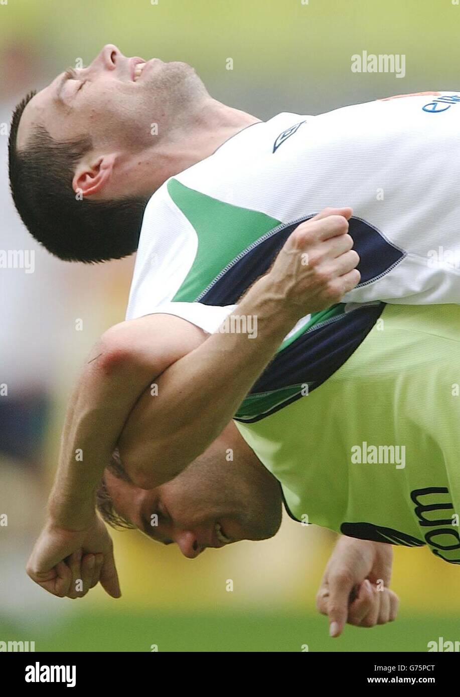 Ireland's Jason McAteer (bottom) and Gary Breen, train at the Suwon ...