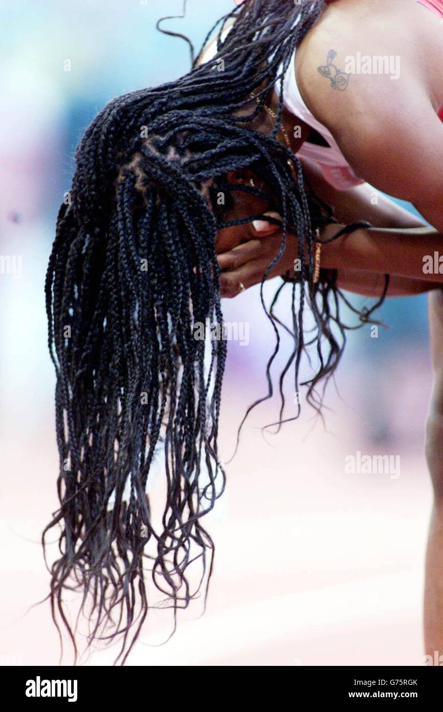 England's Natasha Danvers holds her head after falling at the last ...