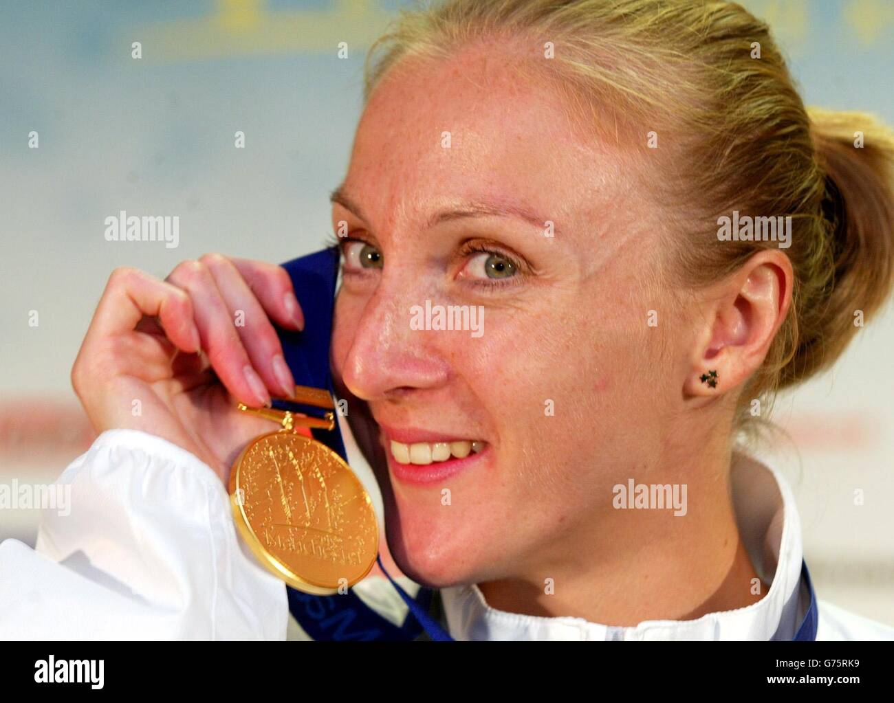England's Paula Radcliffe displays her Commonwealth Games gold medal ...