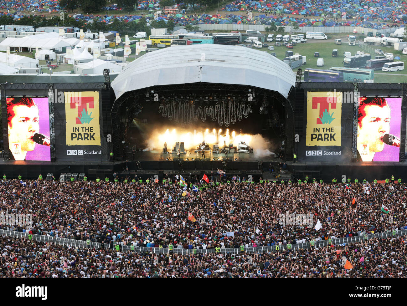 The crowd watching the Arctic Monkeys performing on the Main Stage at ...