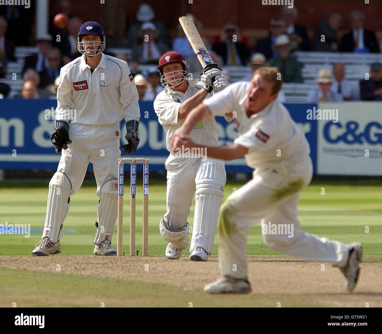 Somerset's Michael Burns hits the ball towards Yorkshire bowler Anthony ...