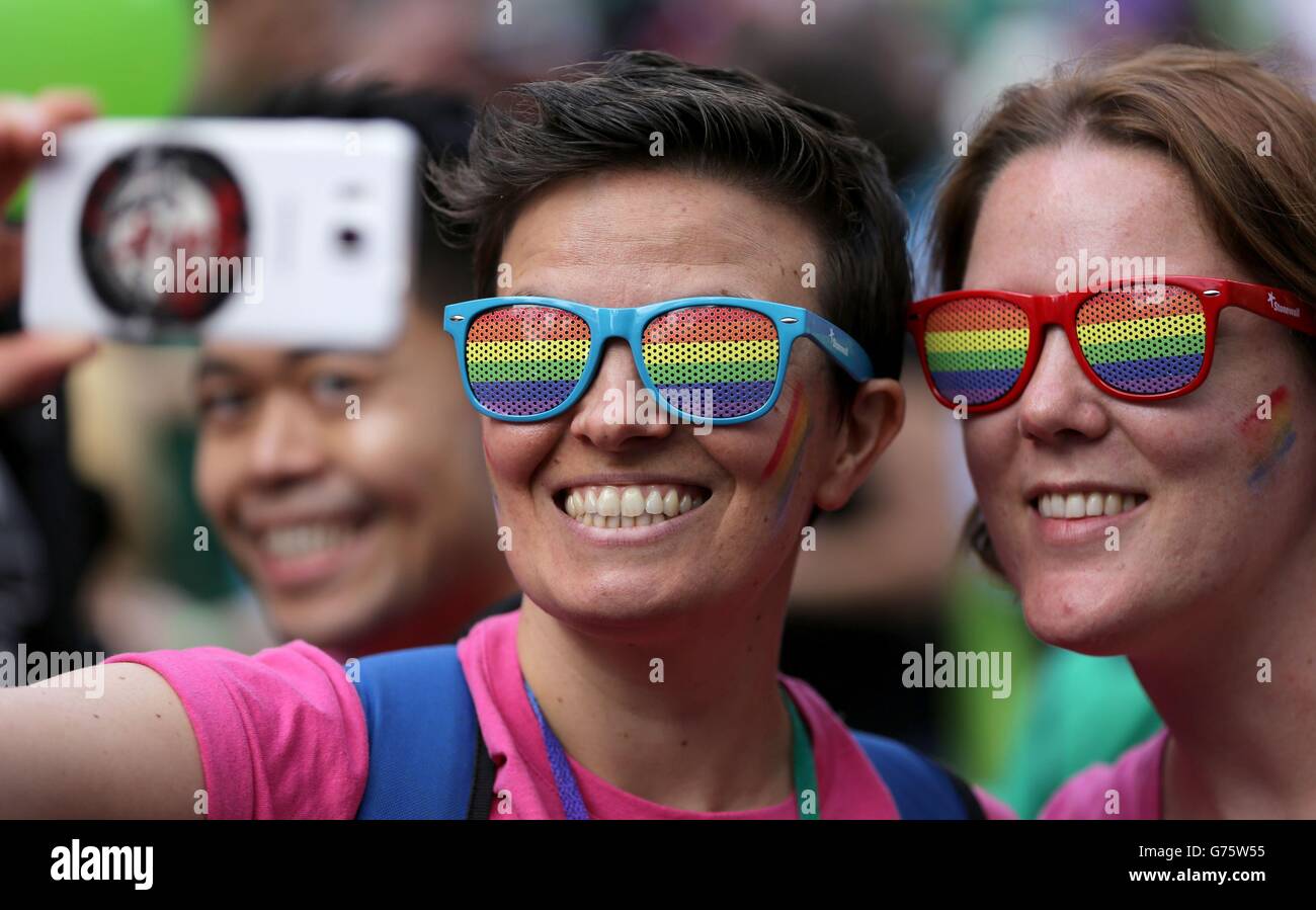 People take selfie while attending the pride in london parade hi-res ...