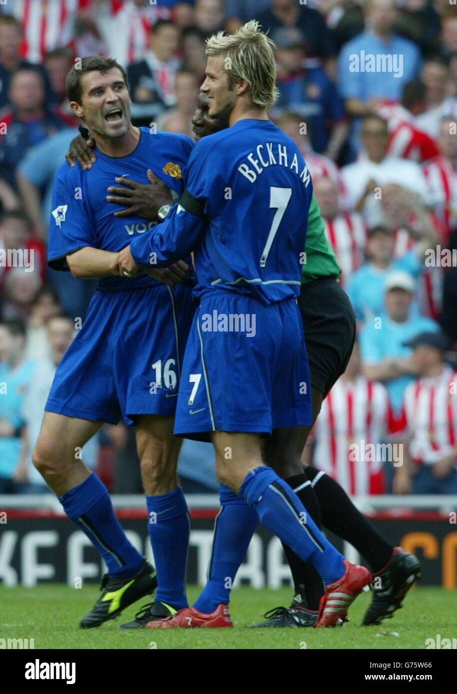 Sport football action argument david beckham roy keane hi-res stock ...