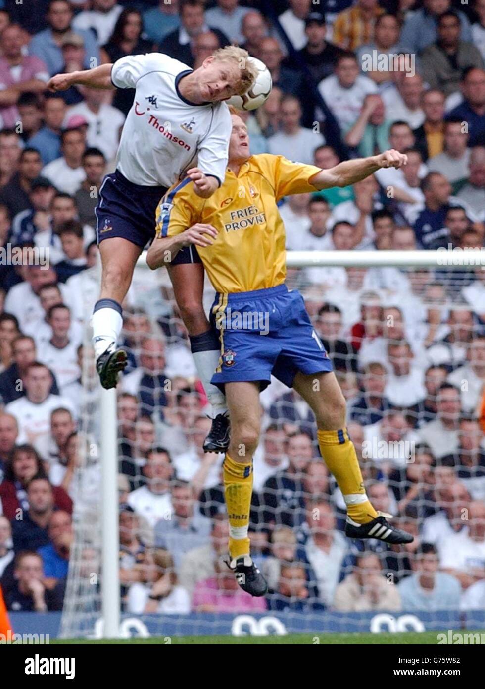 Southhampton's Michael Svensson (right) is beaten to the ball by Spurs ...