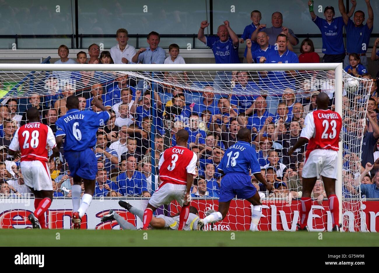 Football action scoring david seaman hi-res stock photography and ...