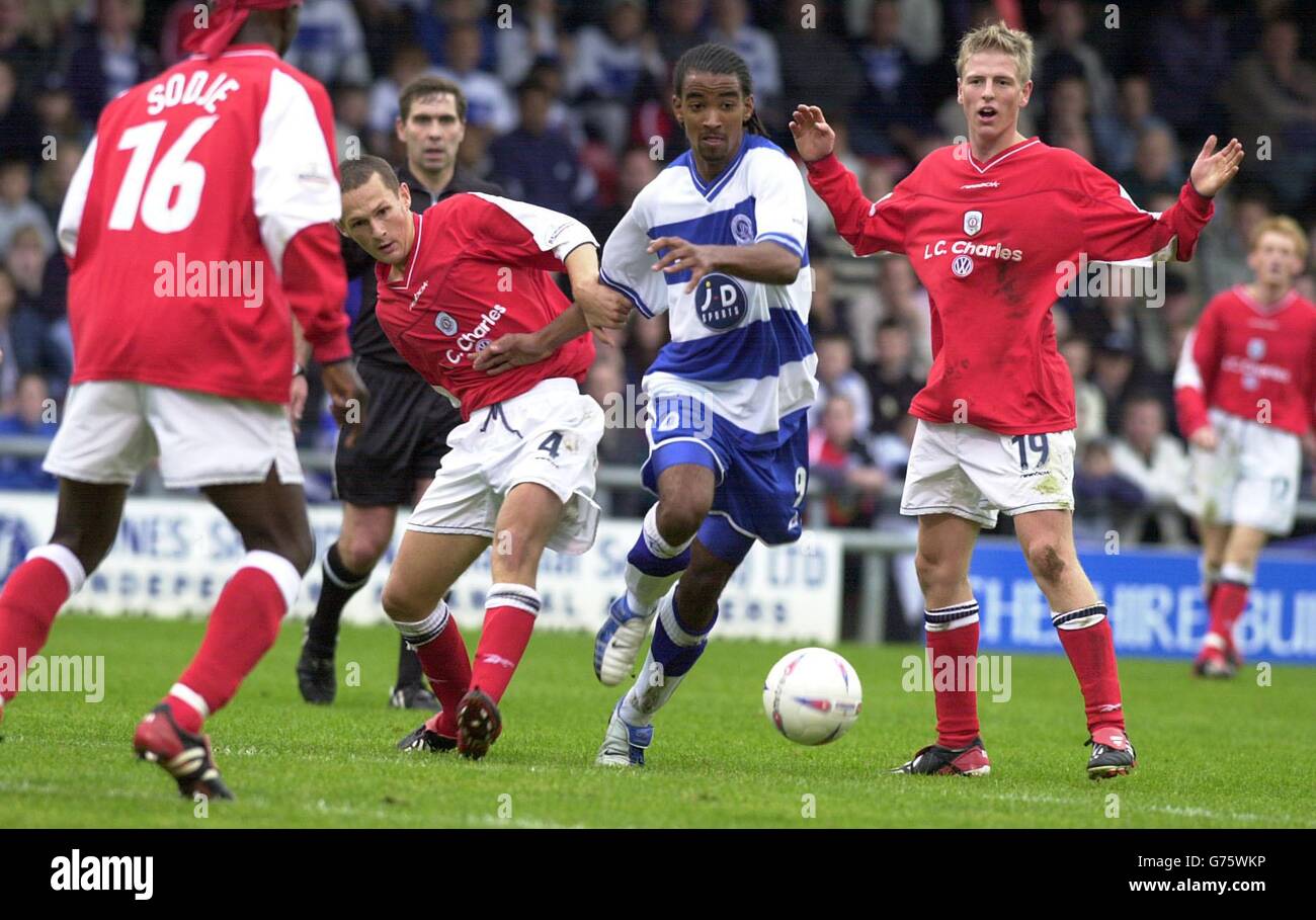 QPR's Richard Langley breaks past Kenny Lunt (4) and Ben Rix, during ...