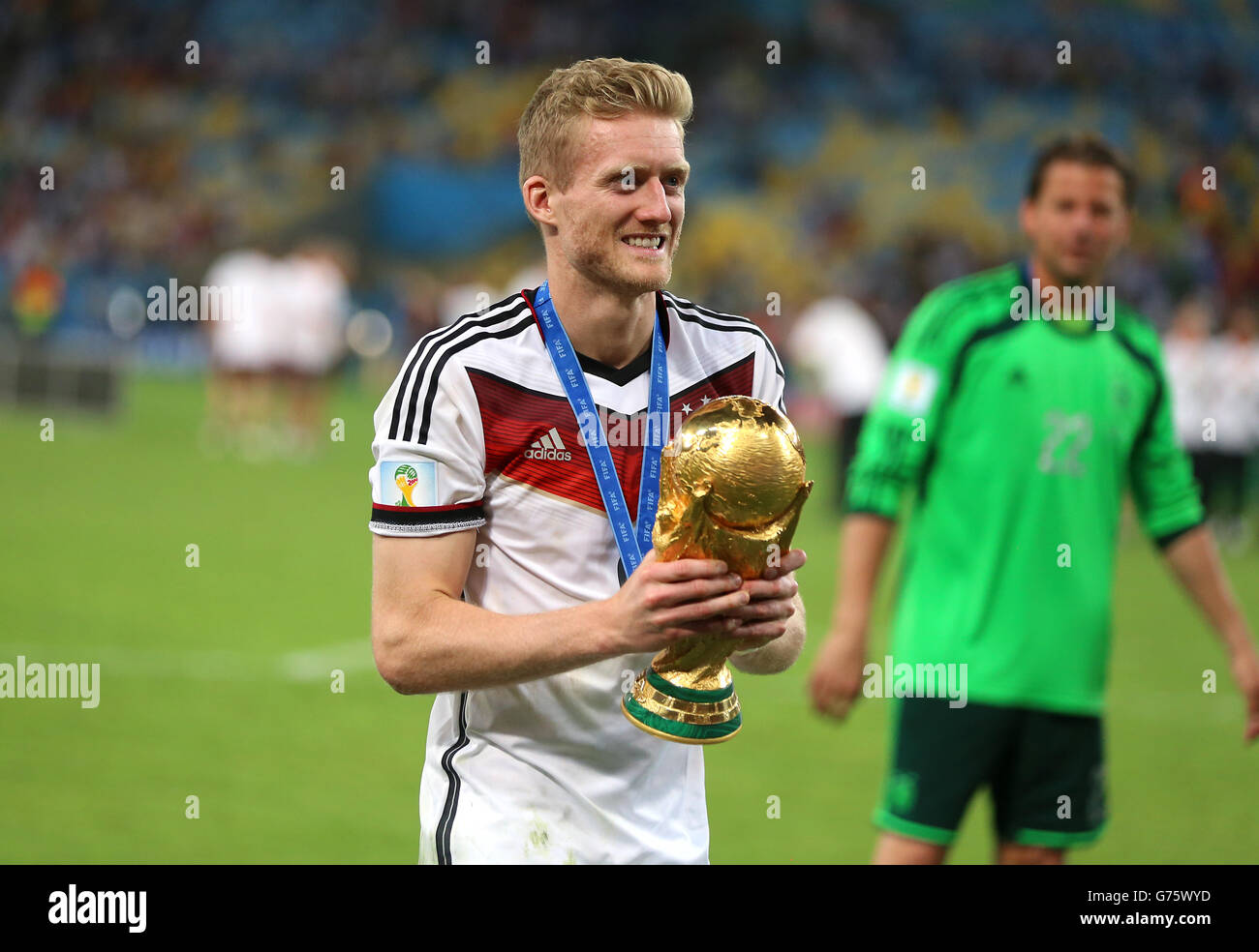 Germanys andre schurrle with the world cup trophy hi-res stock ...