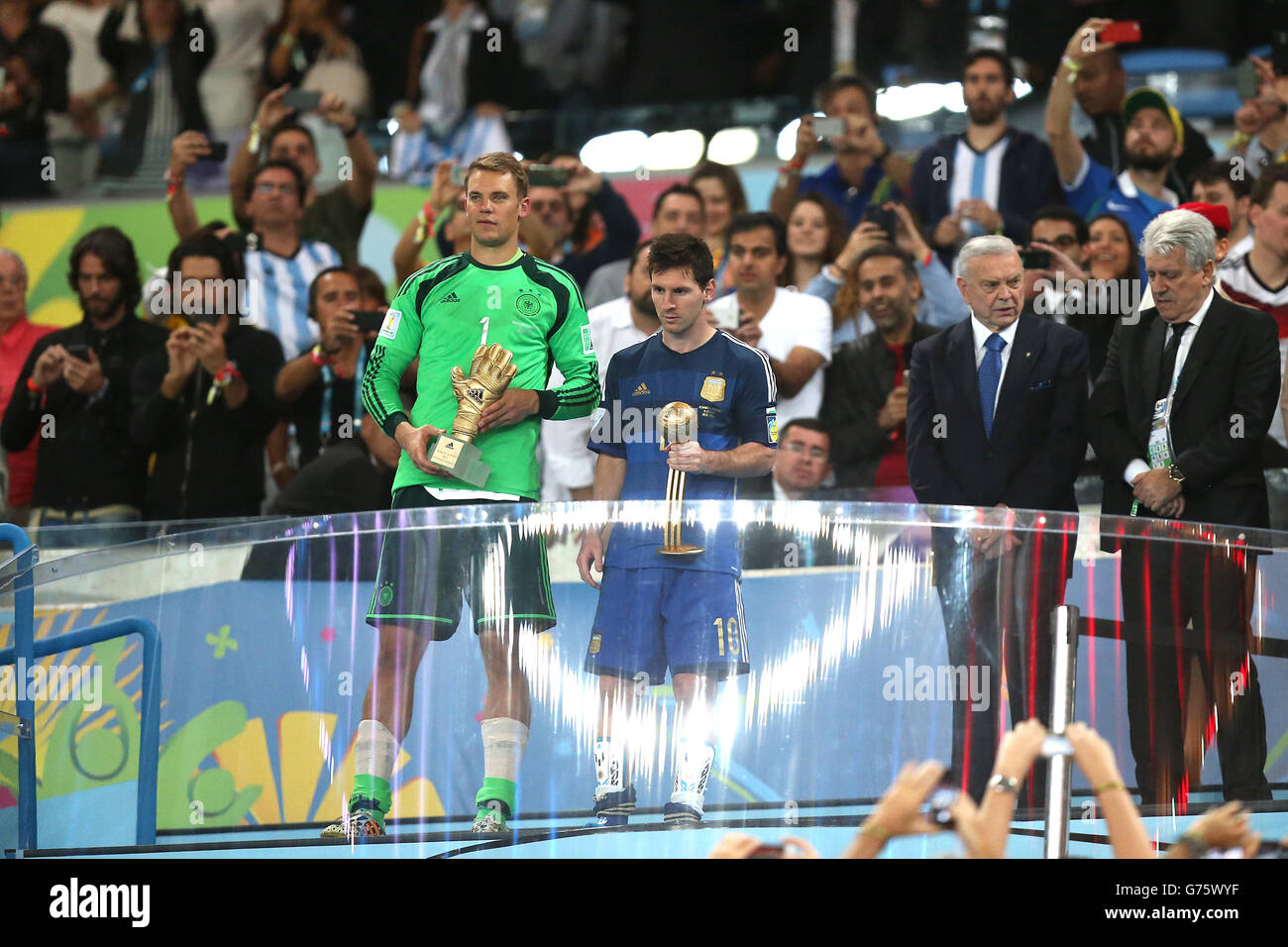 Germany goalkeeper Manuel Neuer (left) with Argentina's Lionel Messi ...