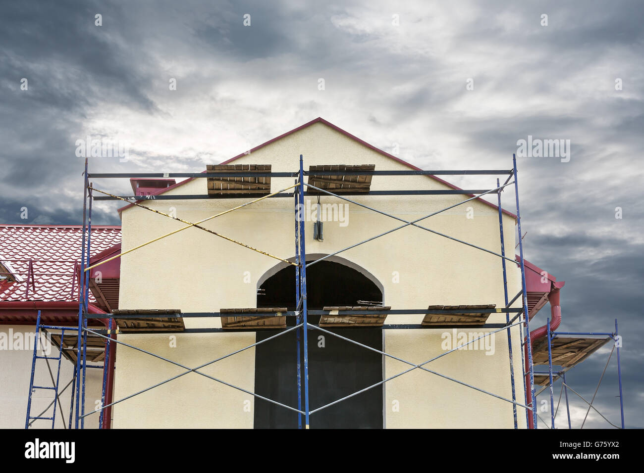 scaffolding near facade wall of building on construction site Stock ...