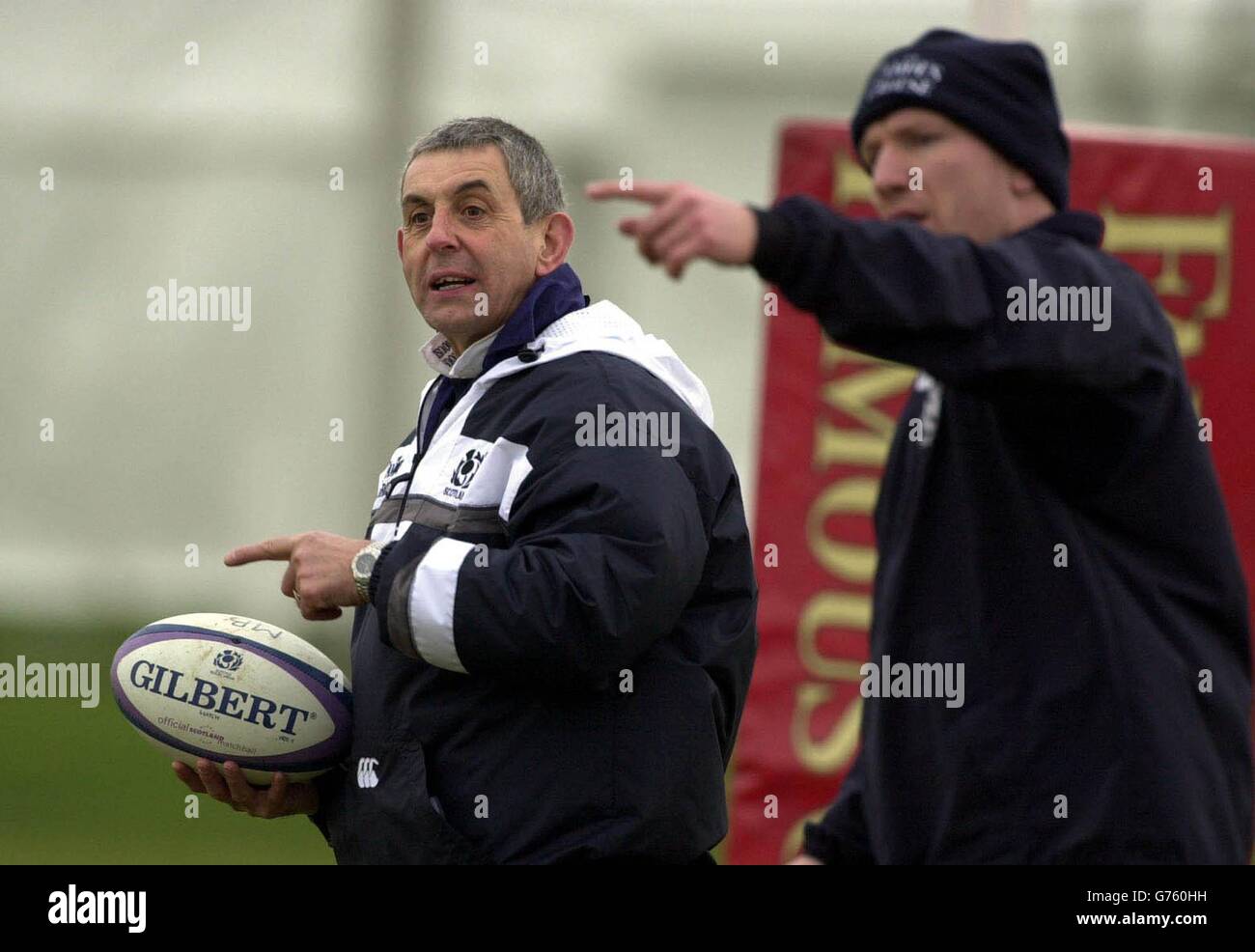 Scotland coach Ian McGeechan (L) talks to Andy Nicol during practice at ...
