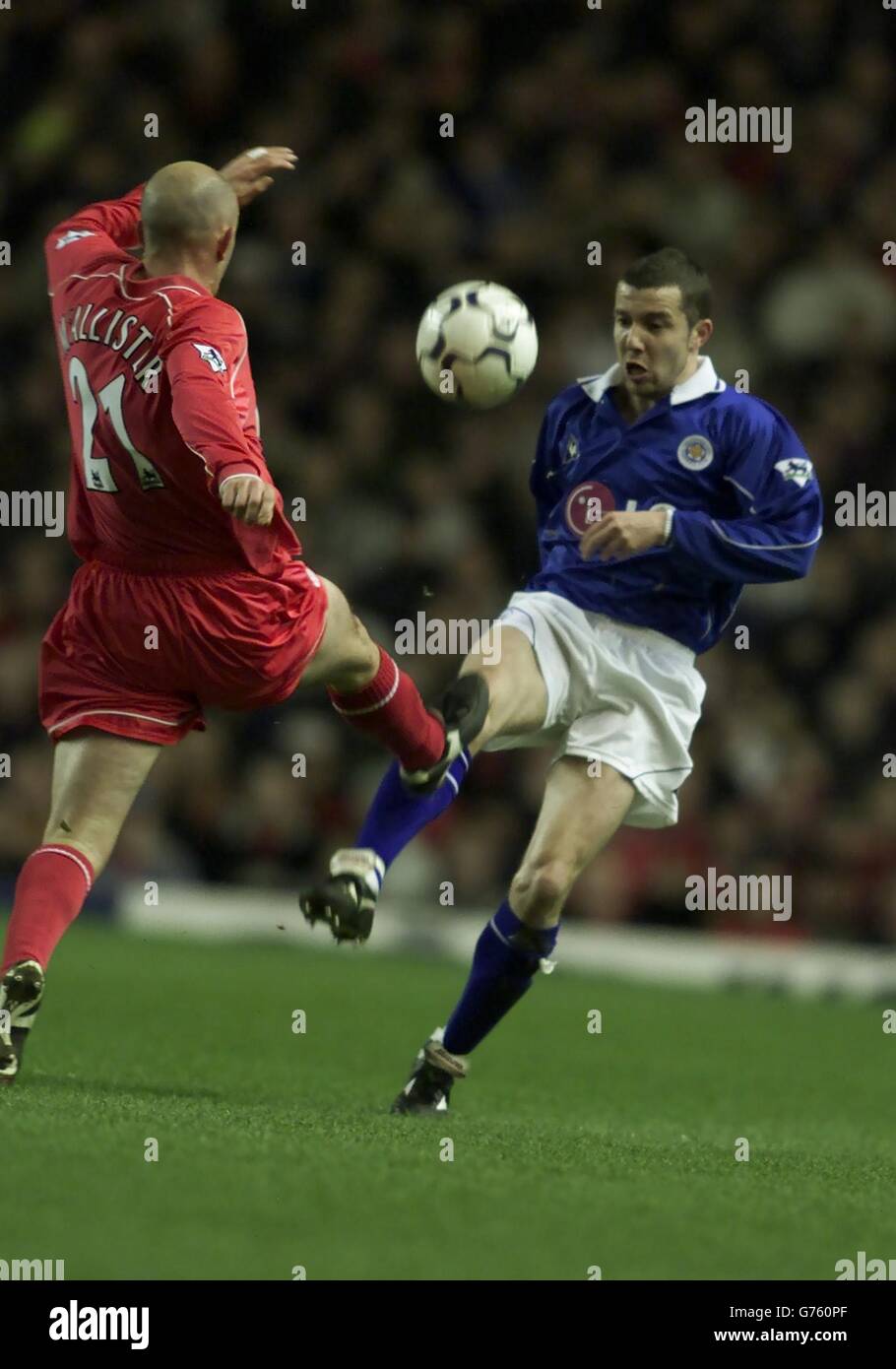 Liverpool's Gary McAllister (left) challenges Mustafa Izzet of ...