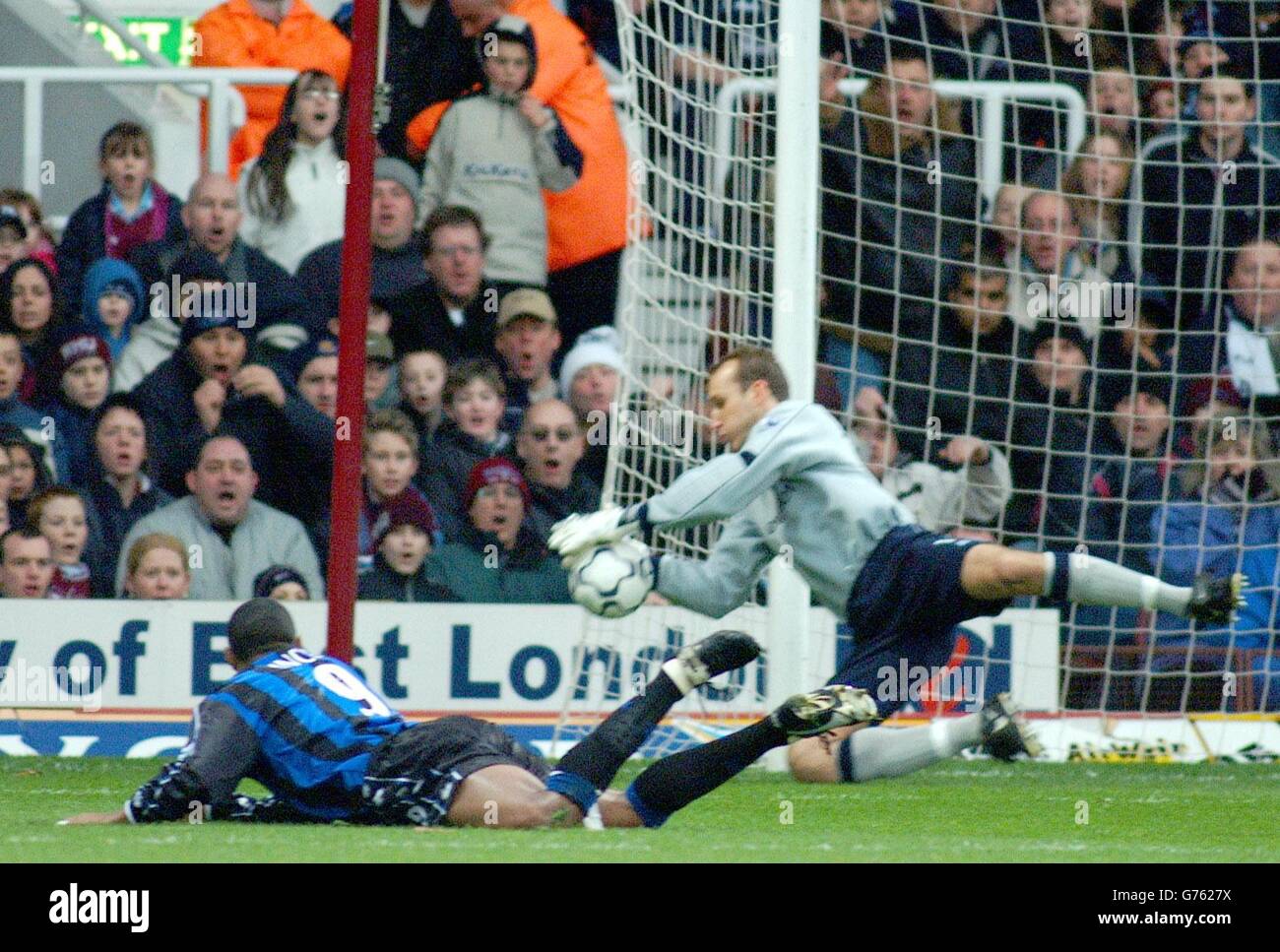Middlesbrough's keeper Mark Schwarzer saves from a Paul Ince (not in ...