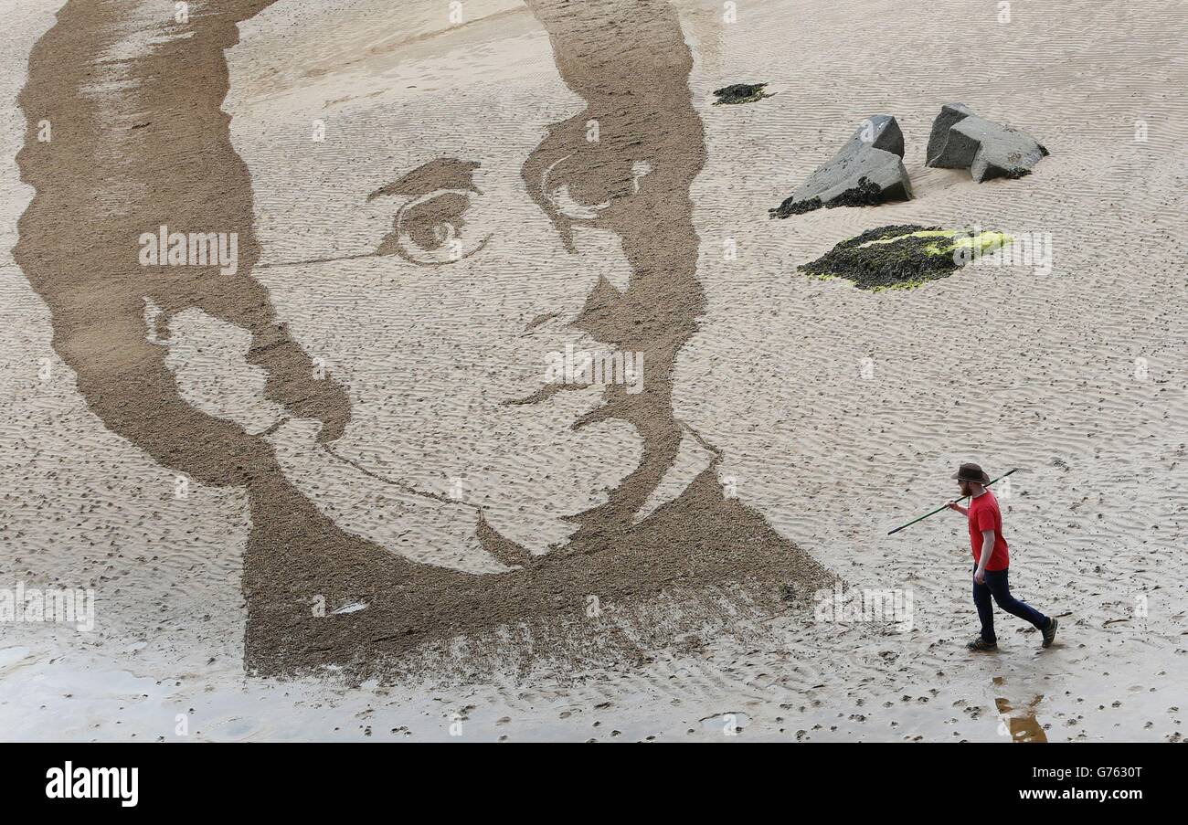 Jamie Wardley from sand sculpture company Sand in Your Eye, creates a ...