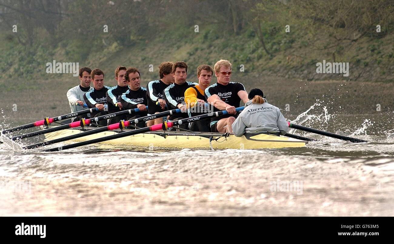 The Cambridge University boat race crew train on the river Thames boat ...