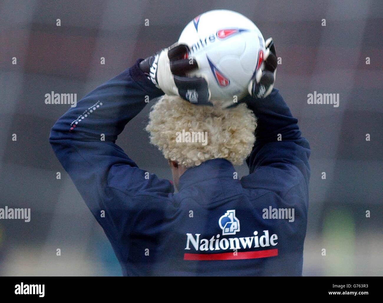 England goalkeeper David James sports an eyecatching hairstyle as he ...