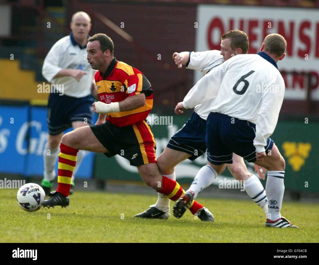 Alex Burns of Partick Thistle breaks through the Ross County defence ...