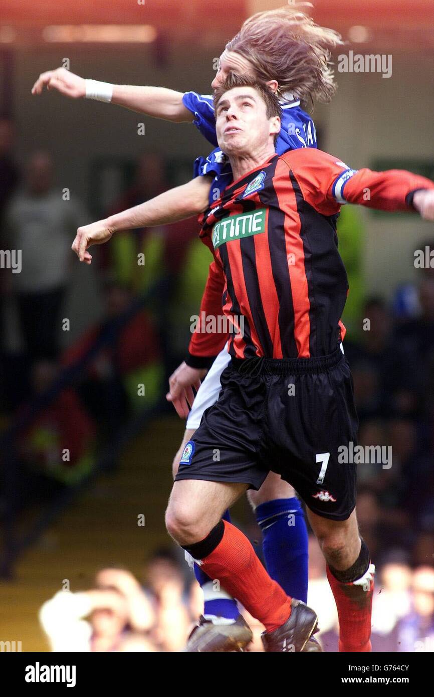 Blackburn Rover's captain Garry Flitcroft is outjumped by Leicester ...