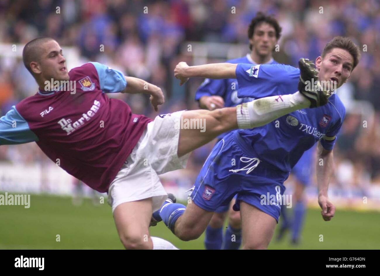 West Hams Joe Cole (left) challenges Matt Holland of Ipswich during the ...