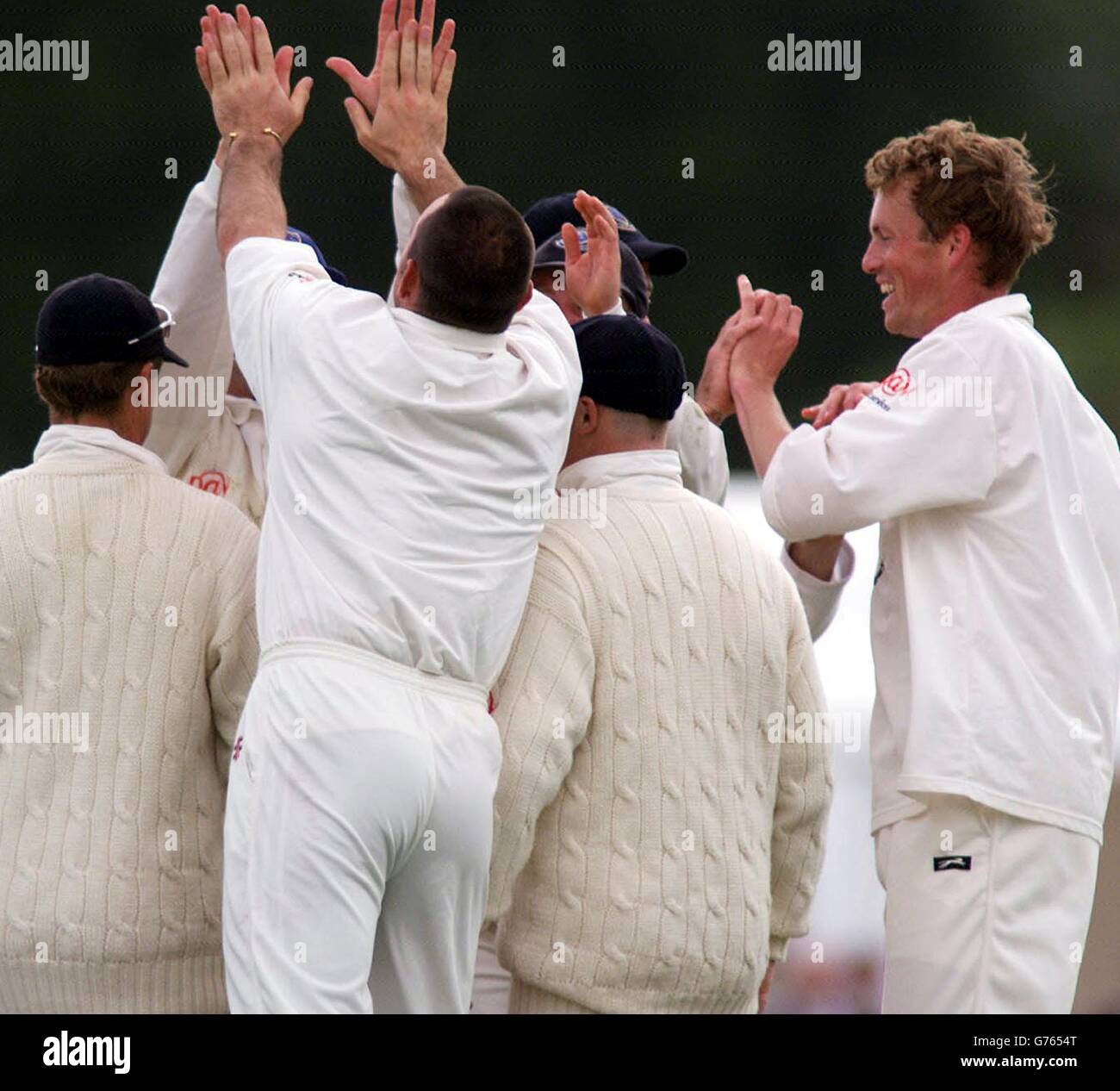 Catcher Michael Yardy (centre back to camera) celebrates with bowler ...