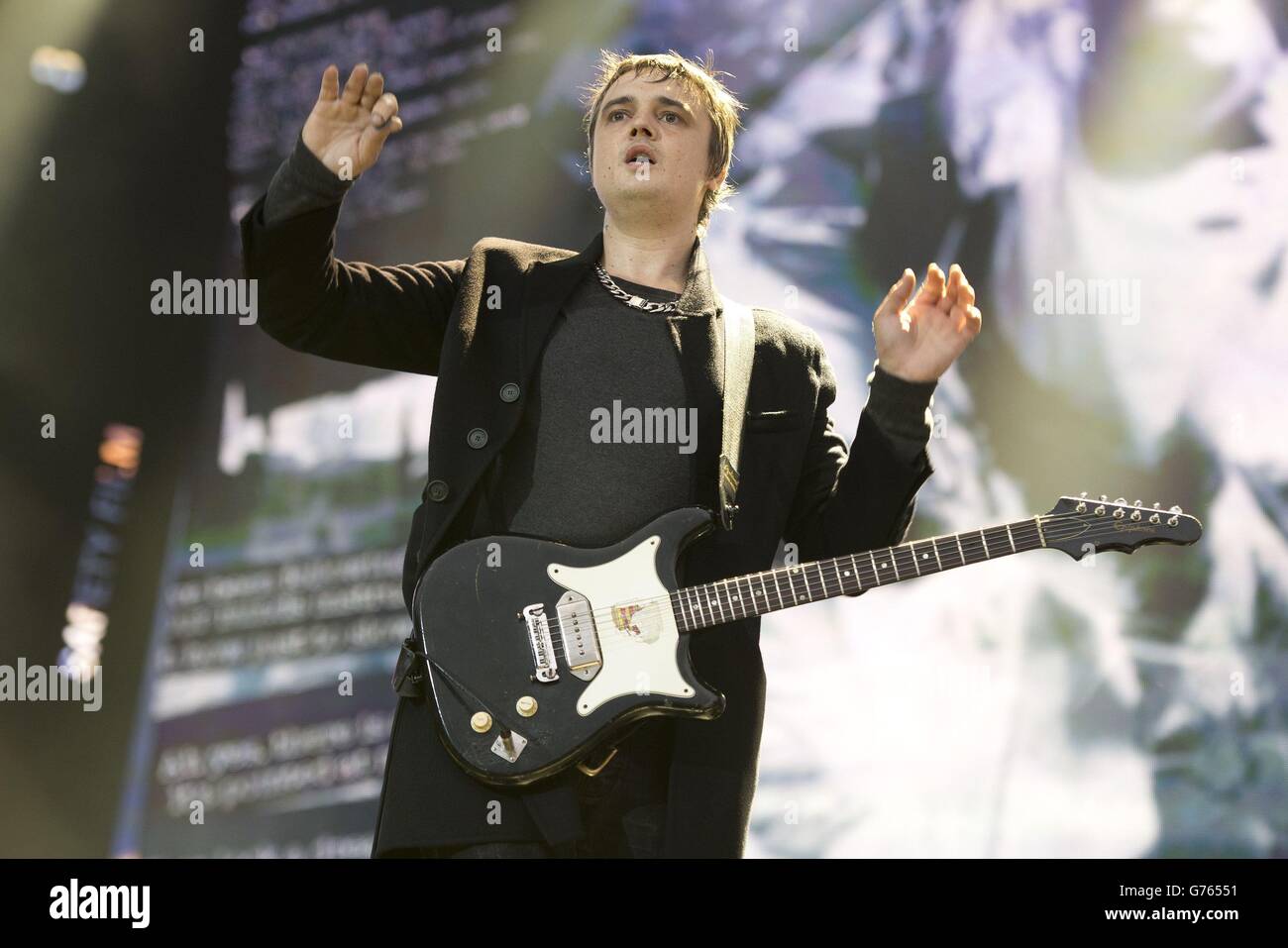 Pete Doherty asks the crowds to step back from the barriers as The ...