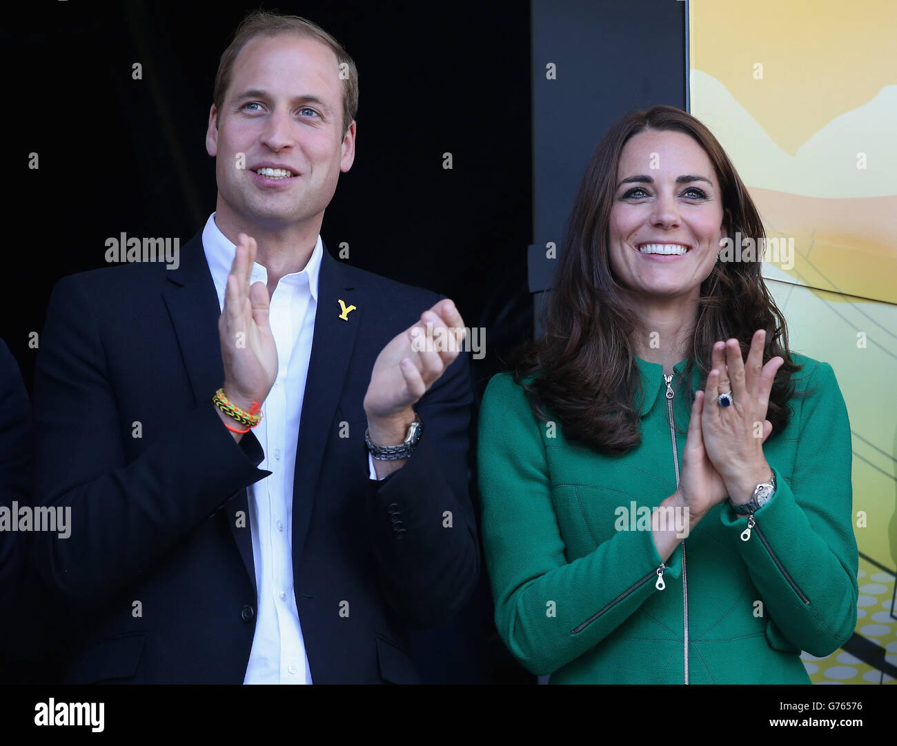 The Duke and Duchess of Cambridge laugh on the podium at the finish ...