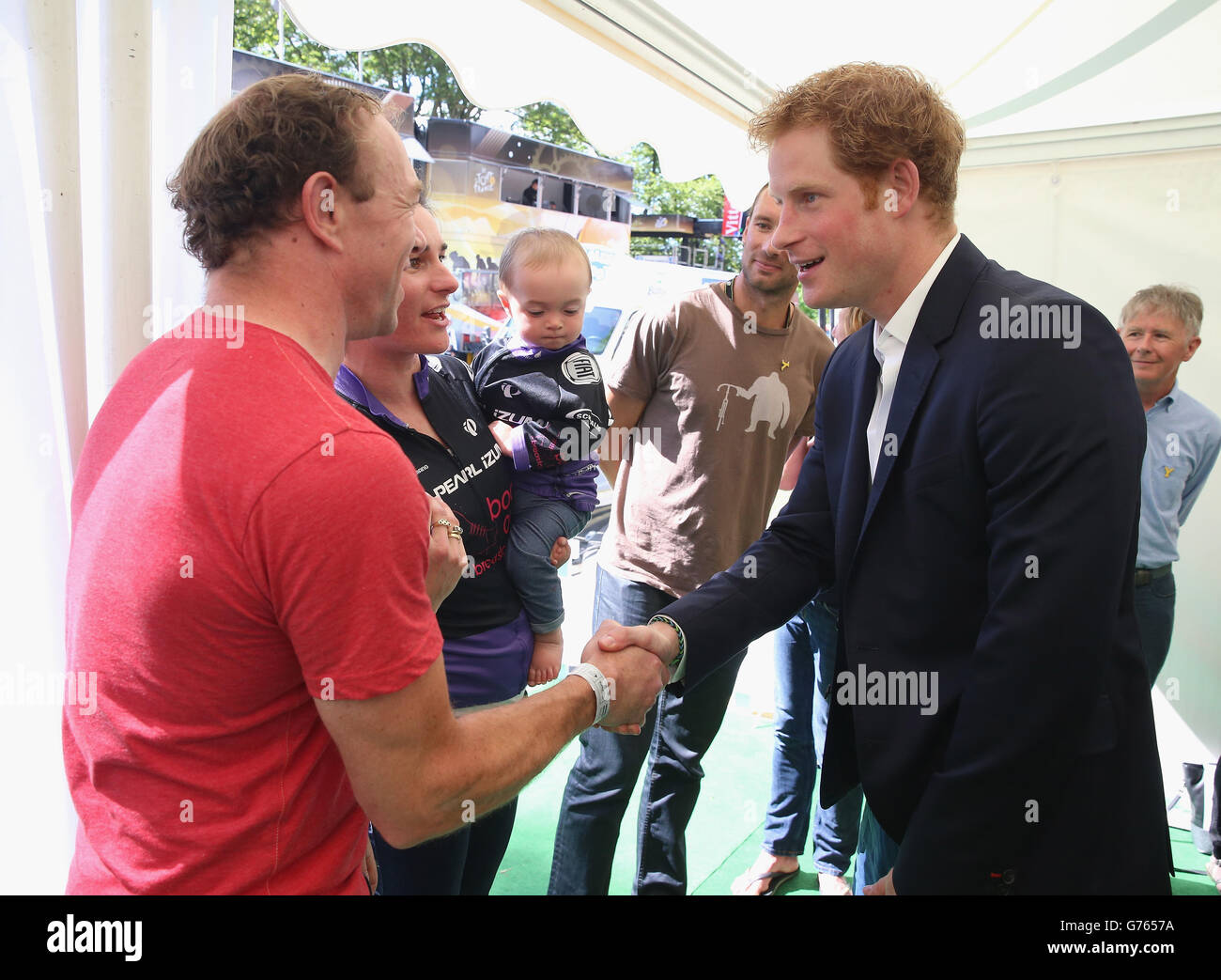 Prince Harry talks to Sarah Storey and her husband Barney with their ...
