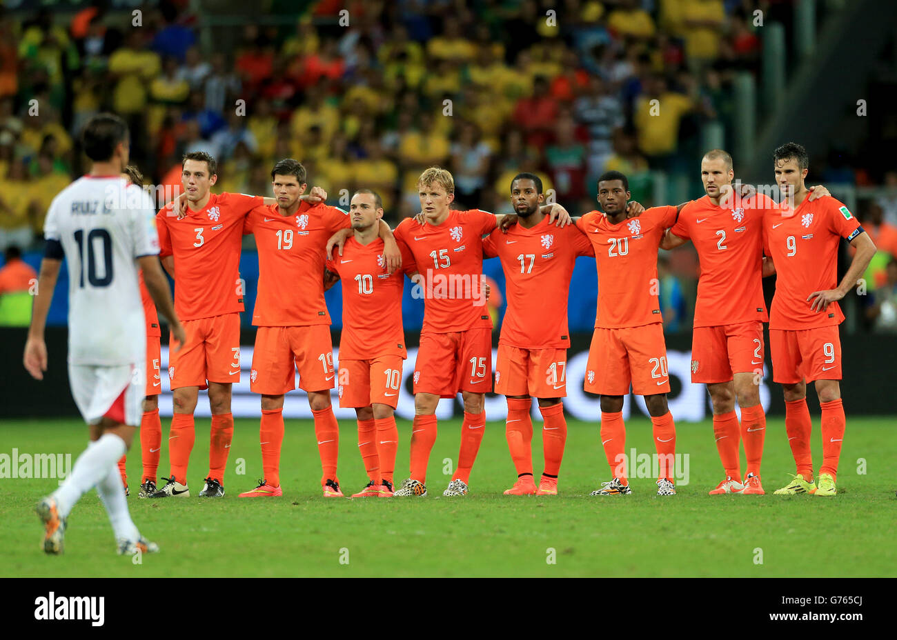 Netherlands players in a line on the halfway line ruing the penalty ...