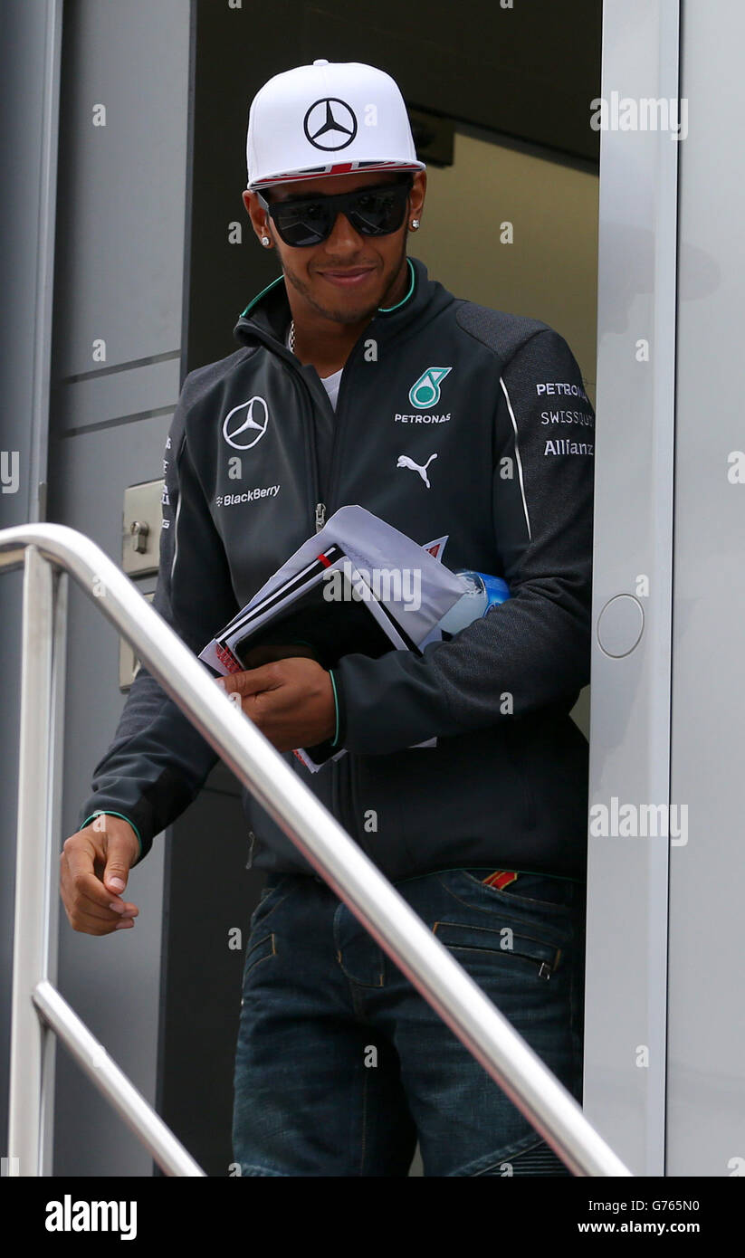 Mercedes' Lewis Hamilton enters the Mercedes motorhome during the 2014 ...
