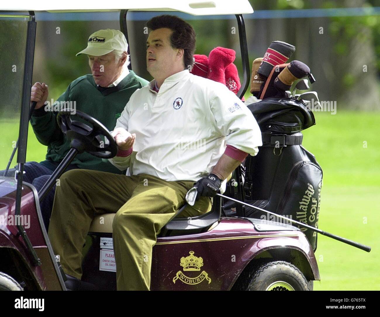 Lord Howland drives a golf buggy during the Victor Chandler British ...