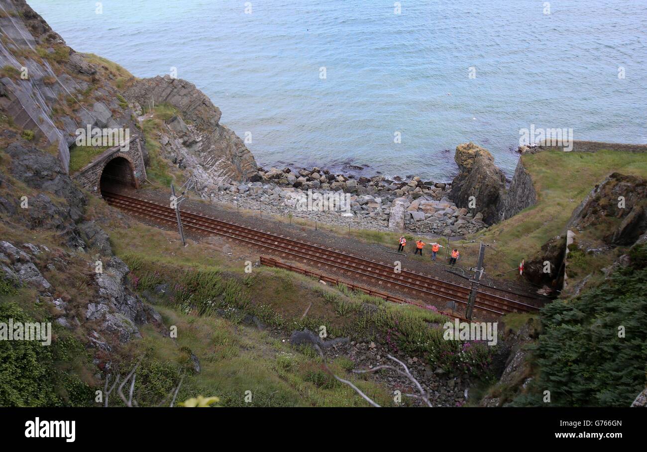Irish Rail workers at the scene where a DART commuter train derailed ...