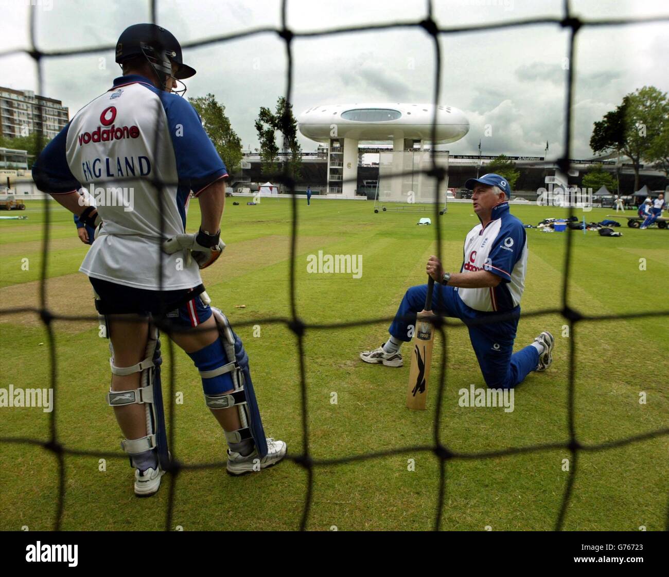England coach Duncan Fletcher (with bat) gives Paul Collingwood some ...
