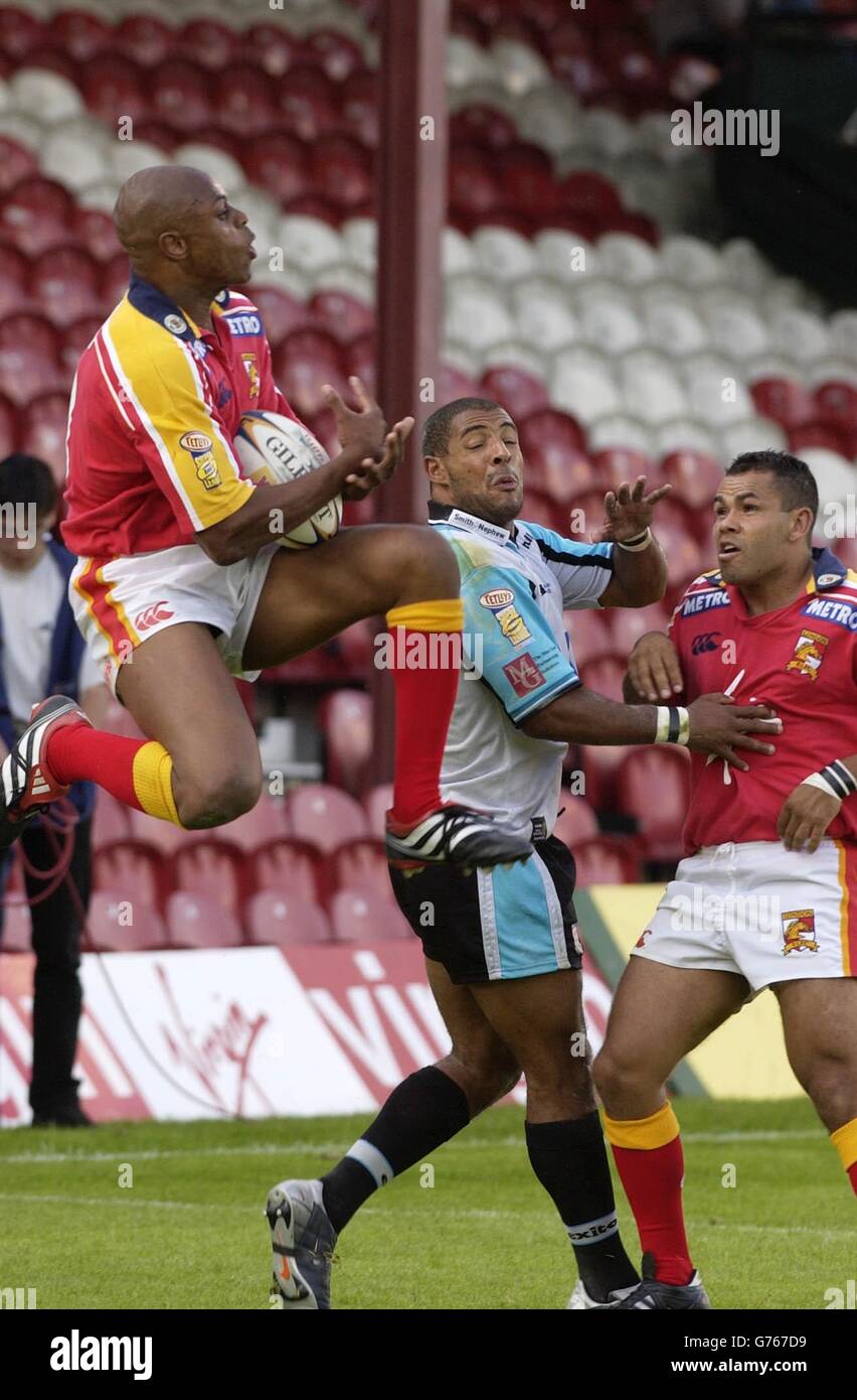 London Broncos' Dominic Peters takes a high ball after confusion ...