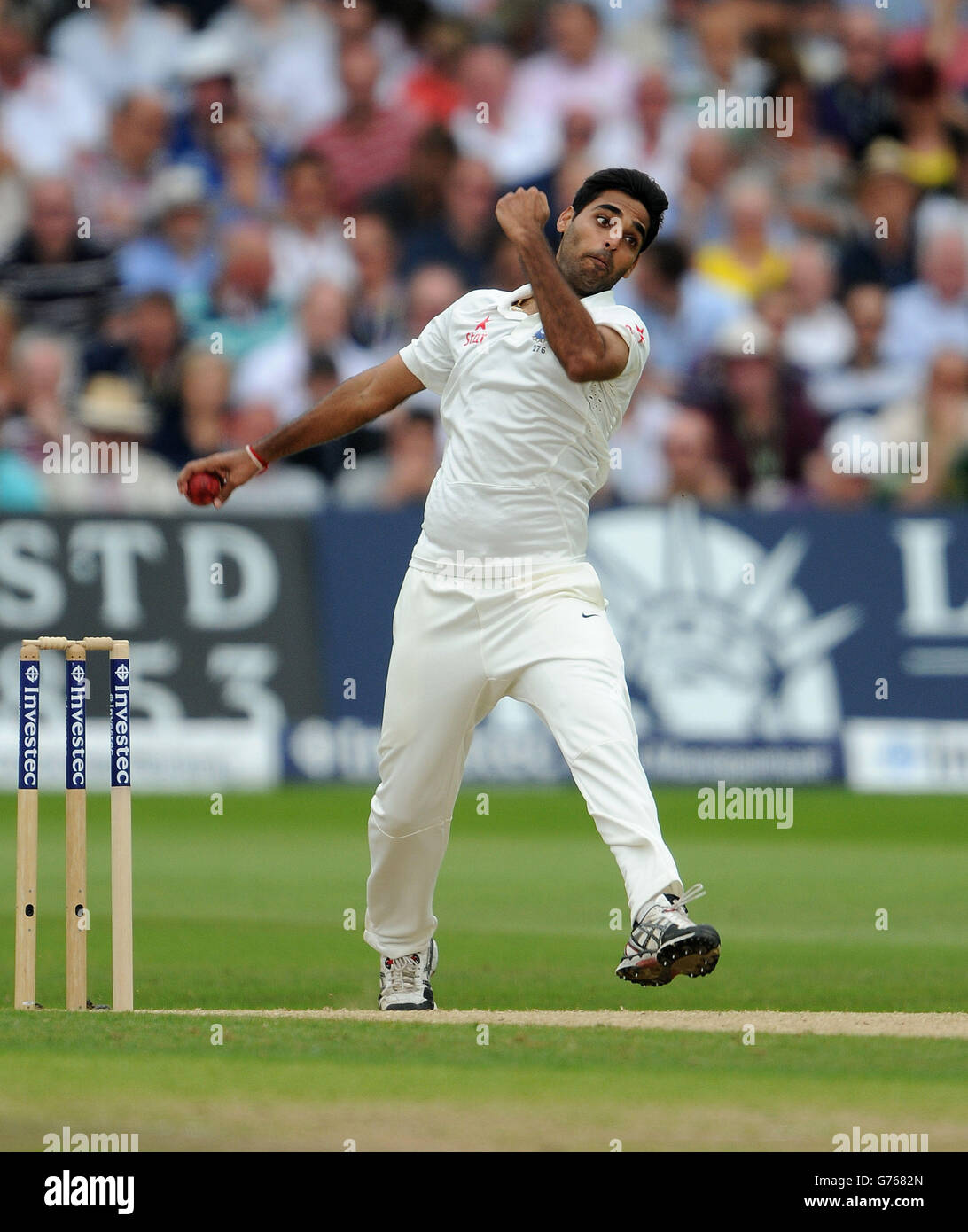 India's Bhuvneshwar Kumar in bowling action against England during day ...