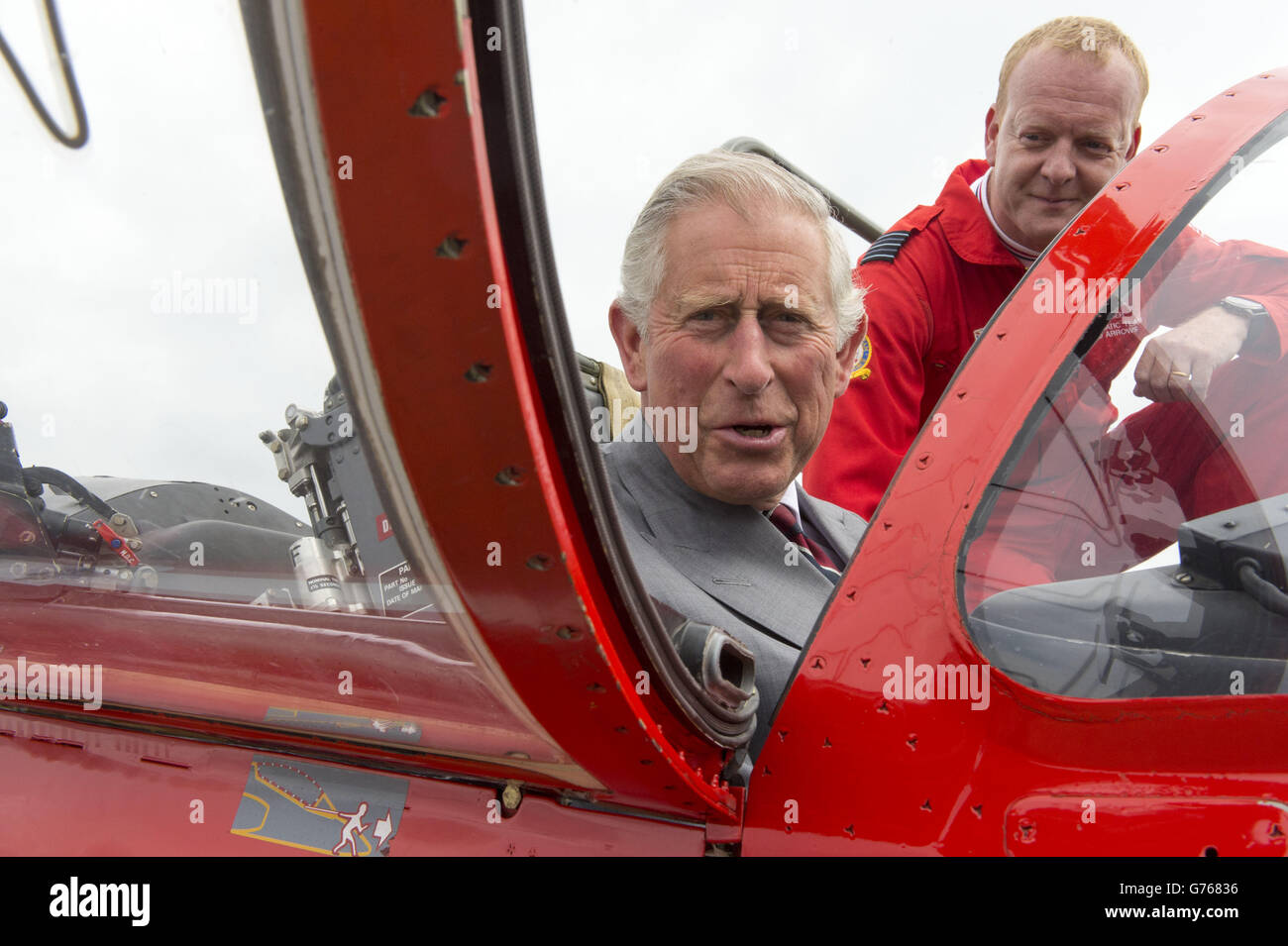 The Prince of Wales is shown a Red Arrows Hawk T1 aircraft by pilot ...