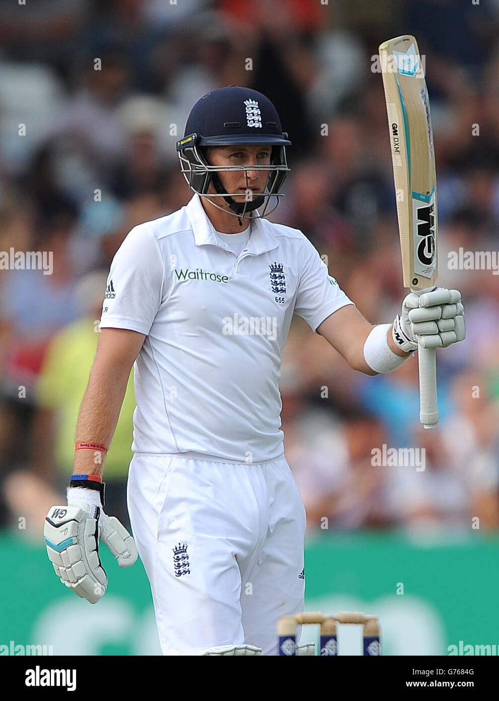 England joe root raises hi-res stock photography and images - Alamy