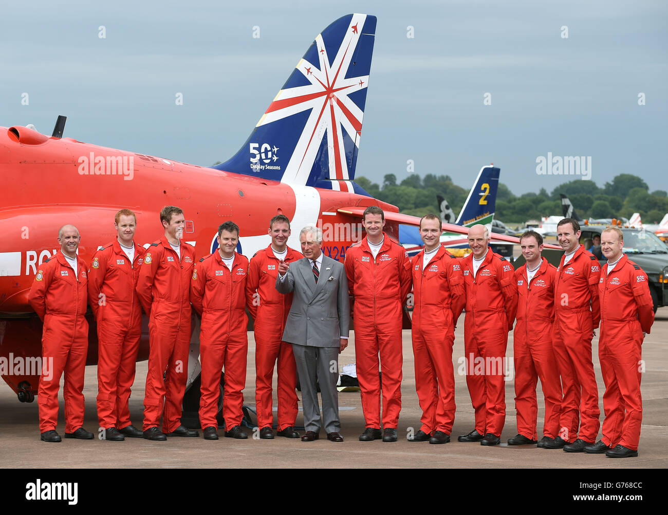 The Prince of Wales with pilots from the Red Arrows during his visit to ...