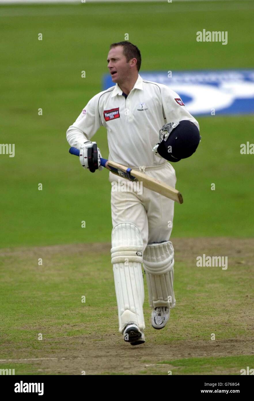 Yorkshire's Man of the Match Craig White comes off the pitch after ...