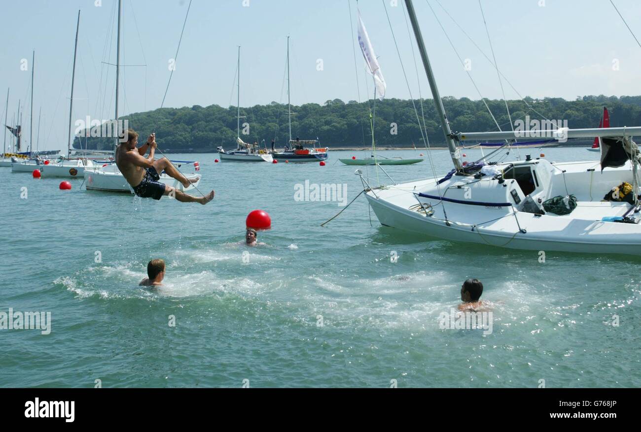 The crew of Charlie Fish take a dip in the sea off Cowes, Isle of Wight ...