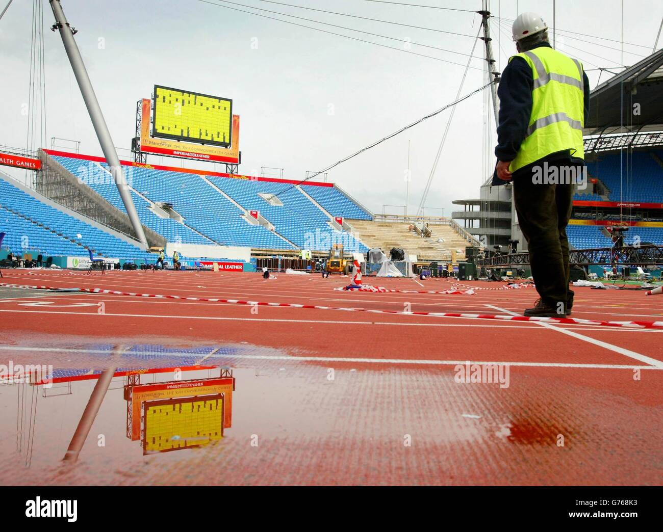 A contractor at work inside the City of Manchester Stadium. After the ...