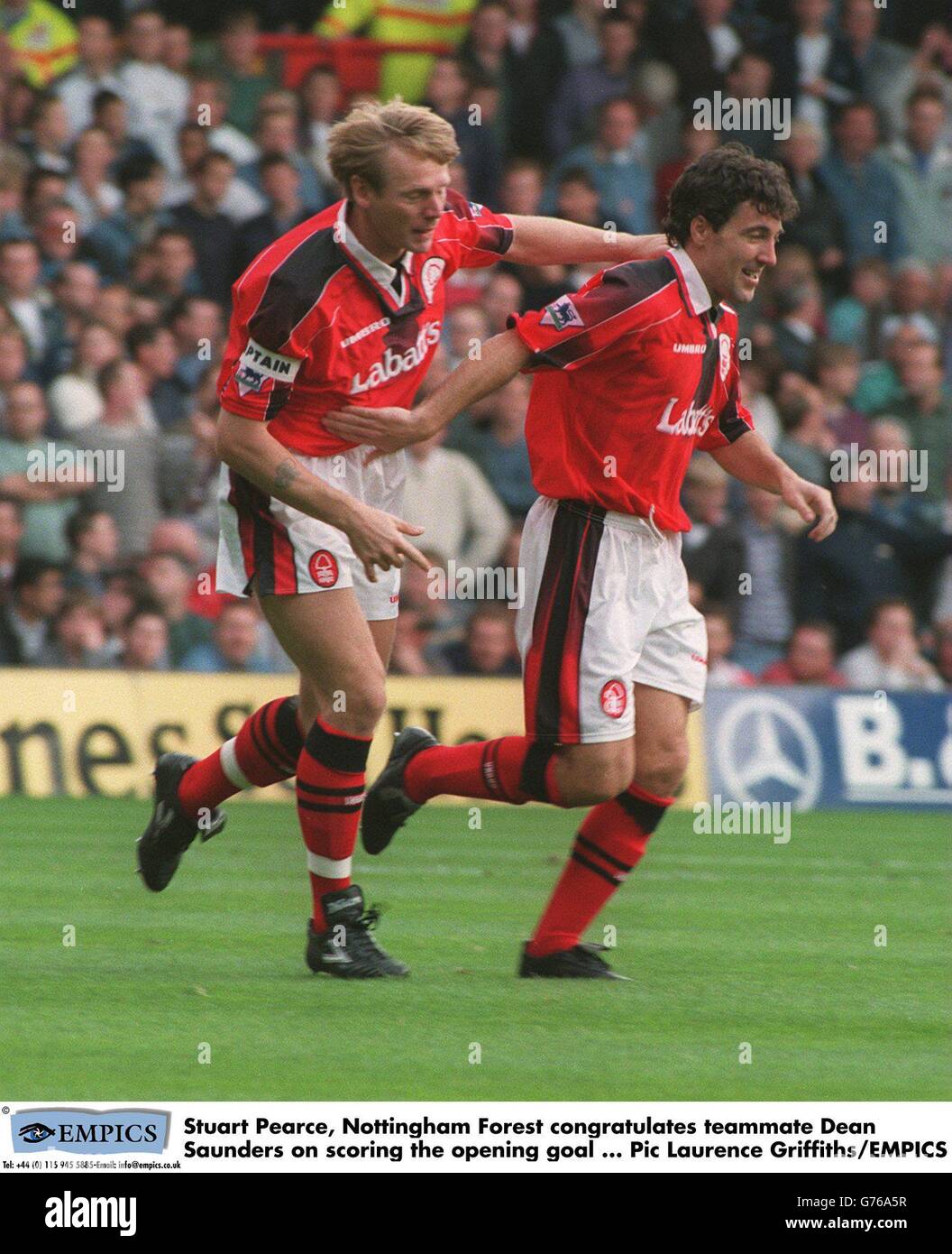 Stuart Pearce, Nottingham Forest congratulates teammate Dean Saunders ...
