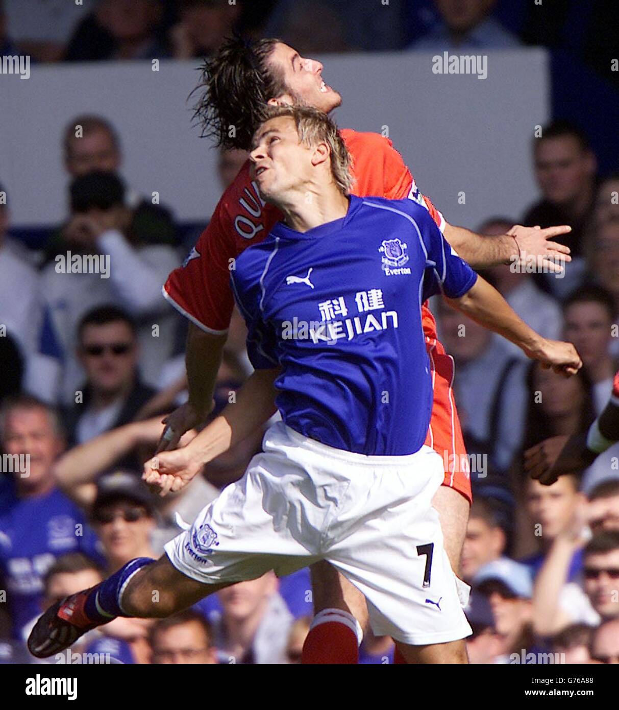 Everton's Niclas Alexanderson (below) challenges Middlesbrough's Franck ...