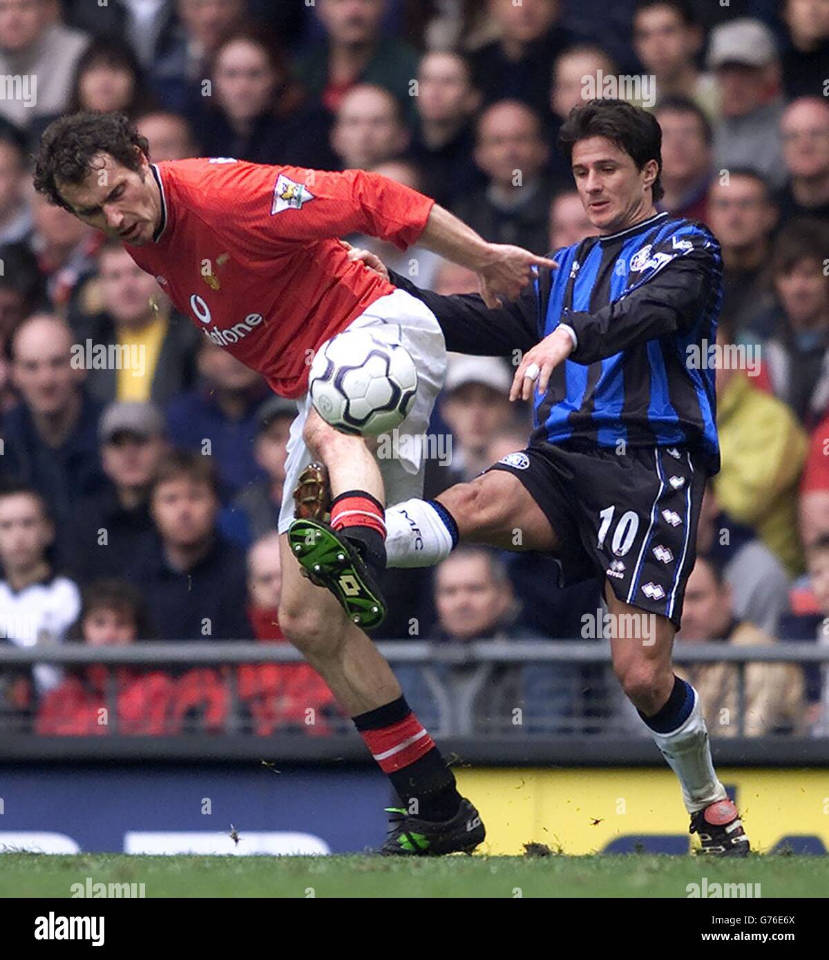 Manchester United's Laurent Blanc (left) challenges Middlesbrough's ...