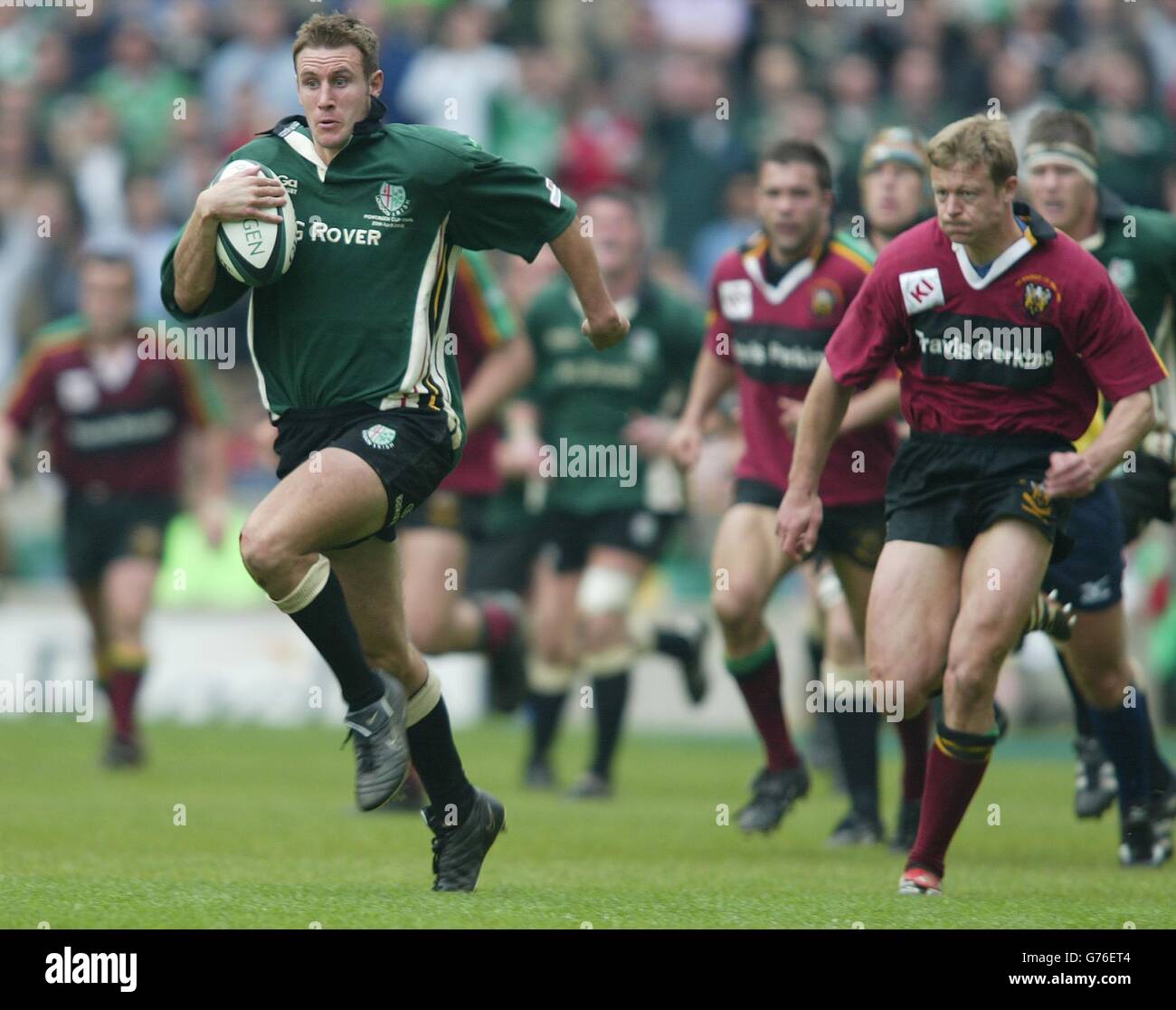 London Irish's Michael Horak breaks away from Northampton's Nick Beal ...