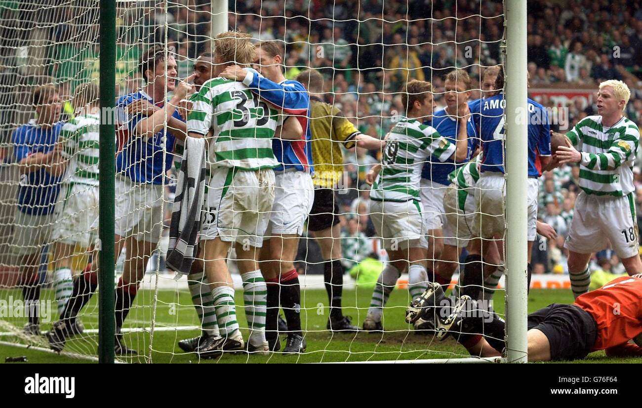 Rangers and Celtic players clash during the Old Firm match in the Bank ...